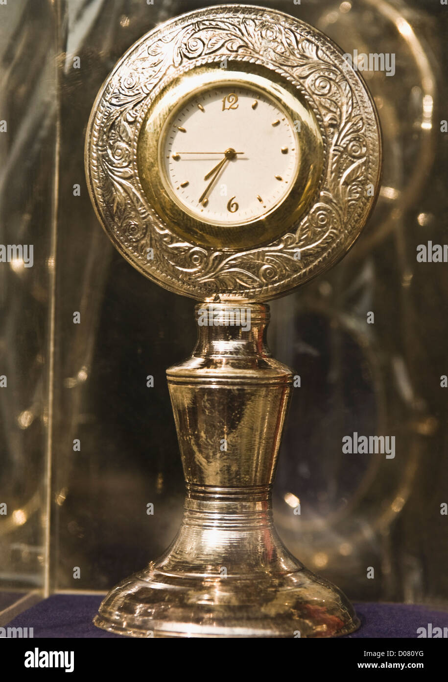 Close-up of a golden clock at a market stall, Delhi, India Stock Photo ...