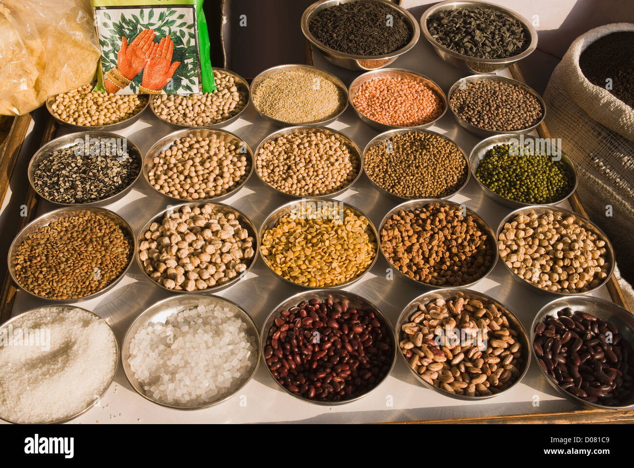 Beans and pulses in bowls at a market stall, Delhi, India Stock Photo ...