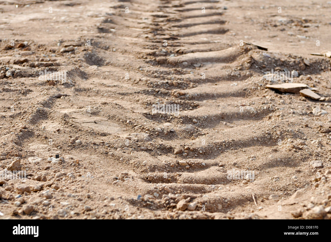 Tractor Tire Track in the Dirt Stock Photo - Alamy