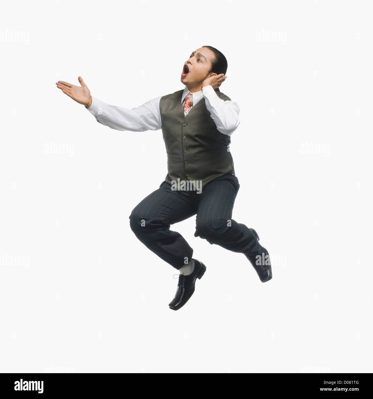 Mime performing as a singer Stock Photo - Alamy
