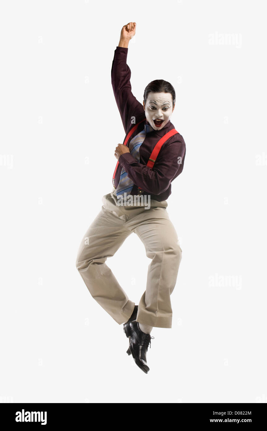 Mime falling isolated over a white background Stock Photo - Alamy