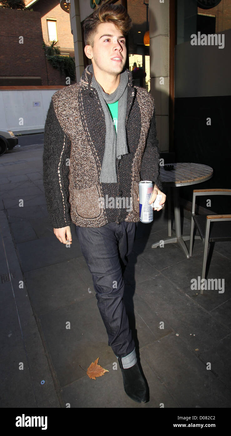 X Factor finalist Aiden Grimshaw carrying a Red Bull drink on his way ...