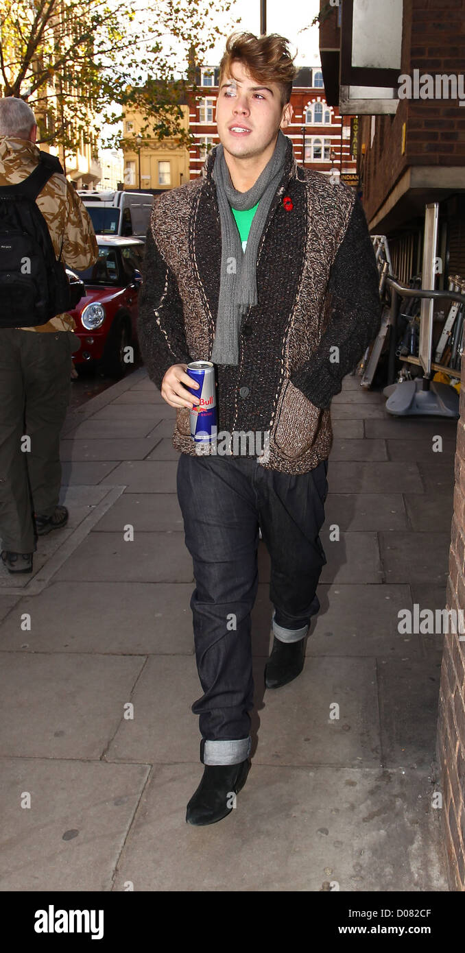 X Factor finalist Aiden Grimshaw carrying a Red Bull drink on his way ...