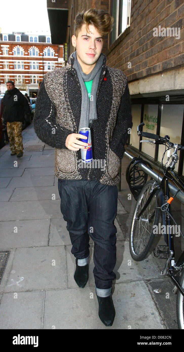 X Factor finalist Aiden Grimshaw carrying a Red Bull drink on his way ...