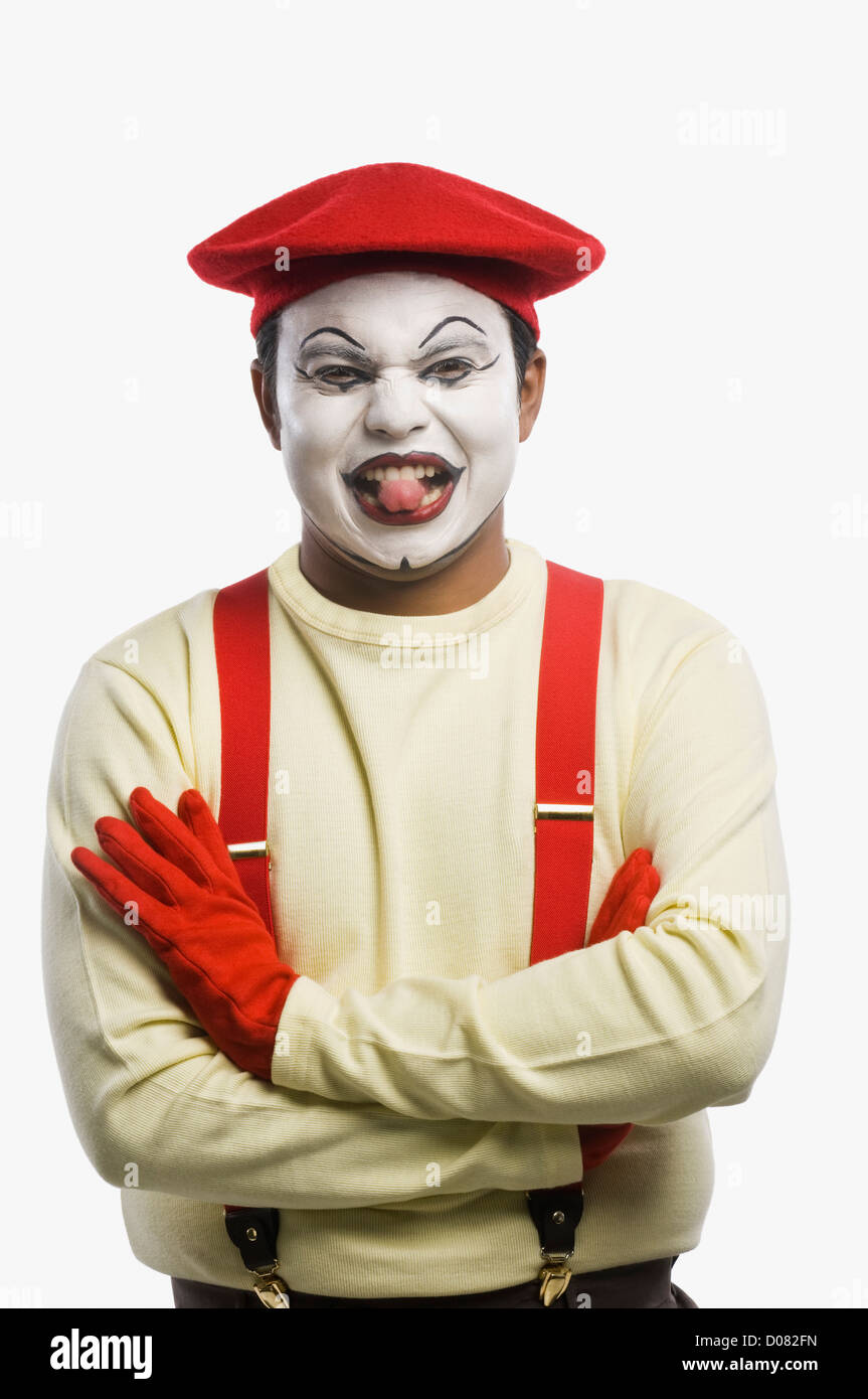 Portrait of a mime sticking his tongue out Stock Photo - Alamy