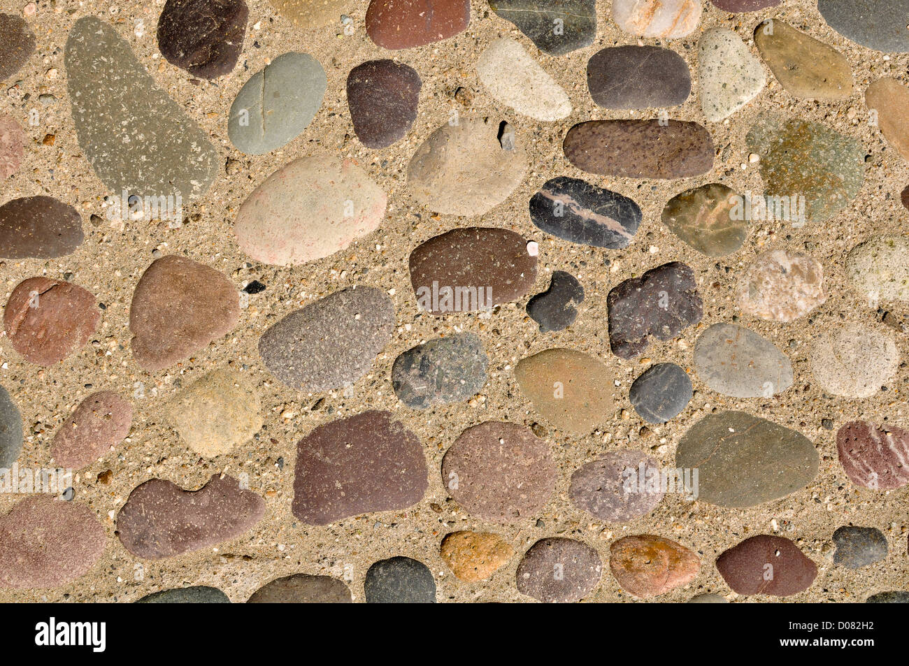 Colorful Rocks and Stones in Sand Background Stock Photo - Alamy