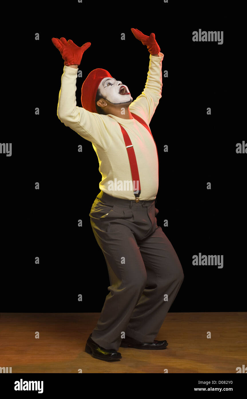 Mime performing on a stage Stock Photo - Alamy