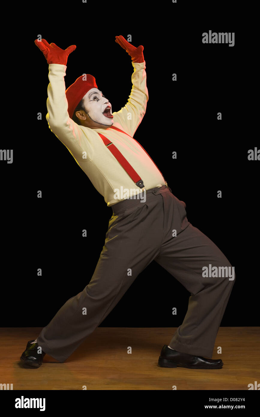 Mime performing on a stage Stock Photo - Alamy