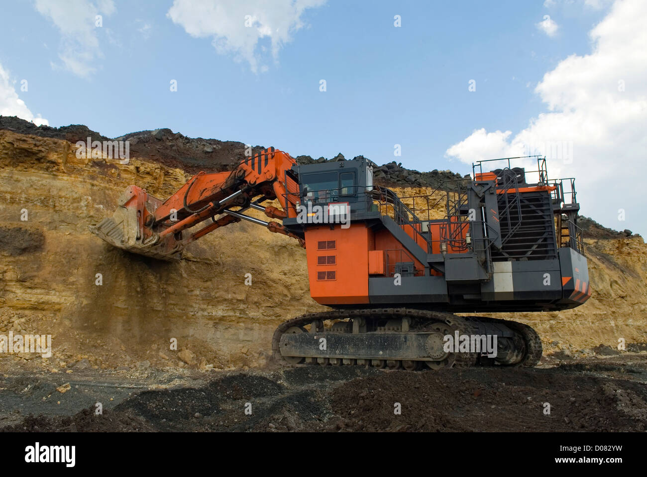 The big dredge digs the earth Stock Photo - Alamy