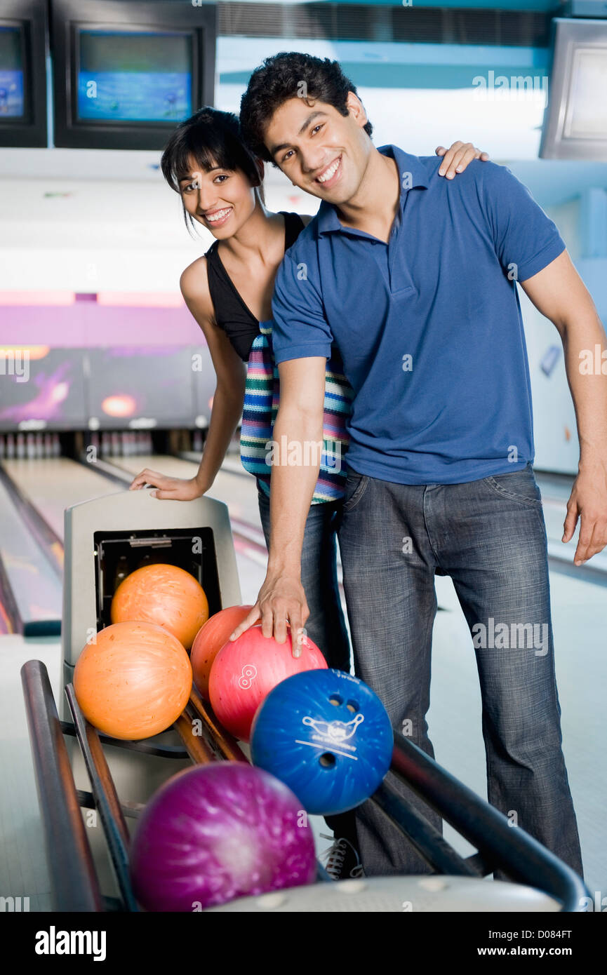 Portrait three friends in bowling hi-res stock photography and images ...