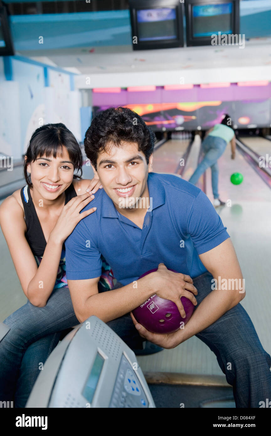 Portrait three friends in bowling hi-res stock photography and images ...