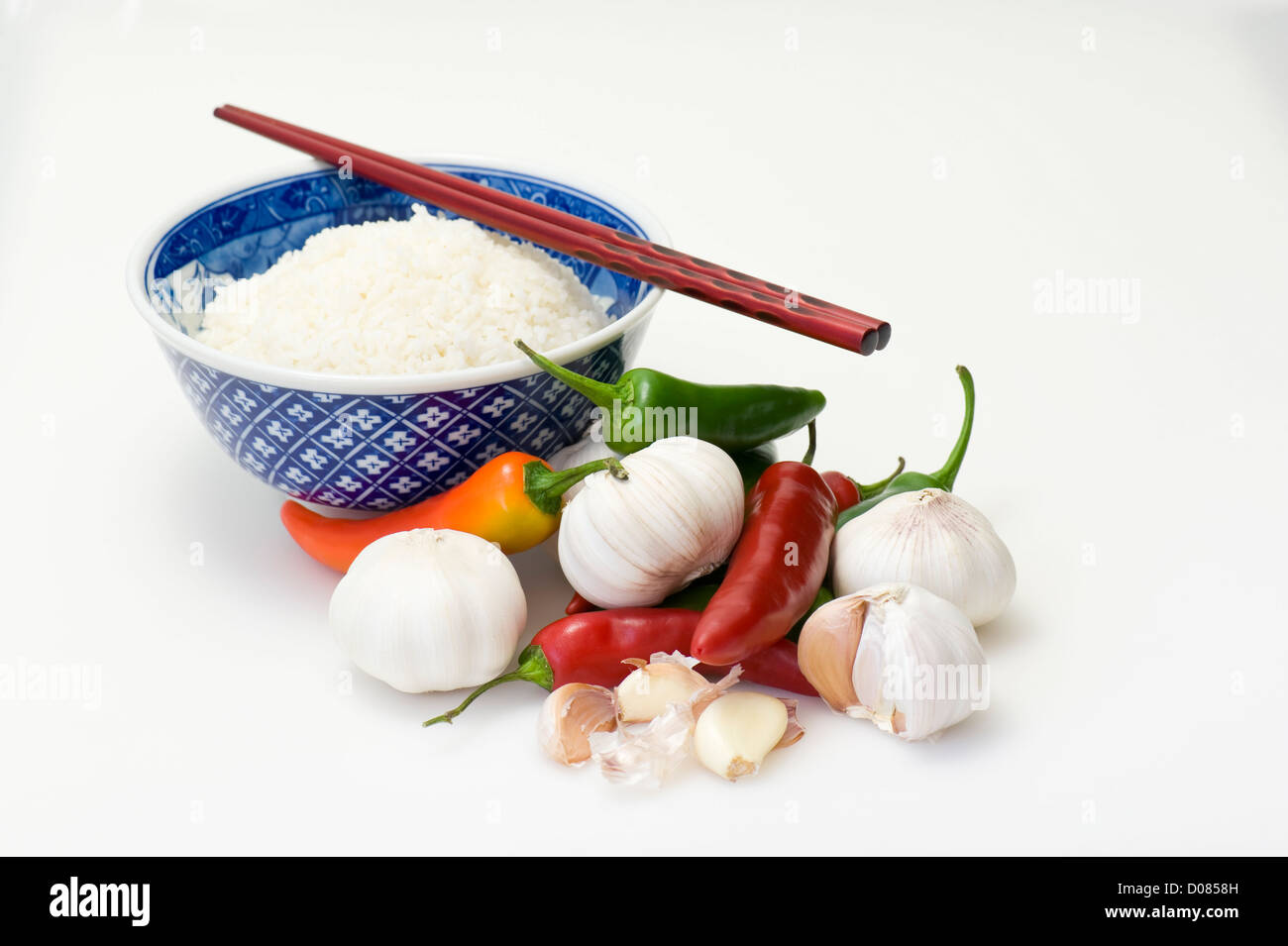 Asian cooking ingredients with rice bowl Stock Photo - Alamy