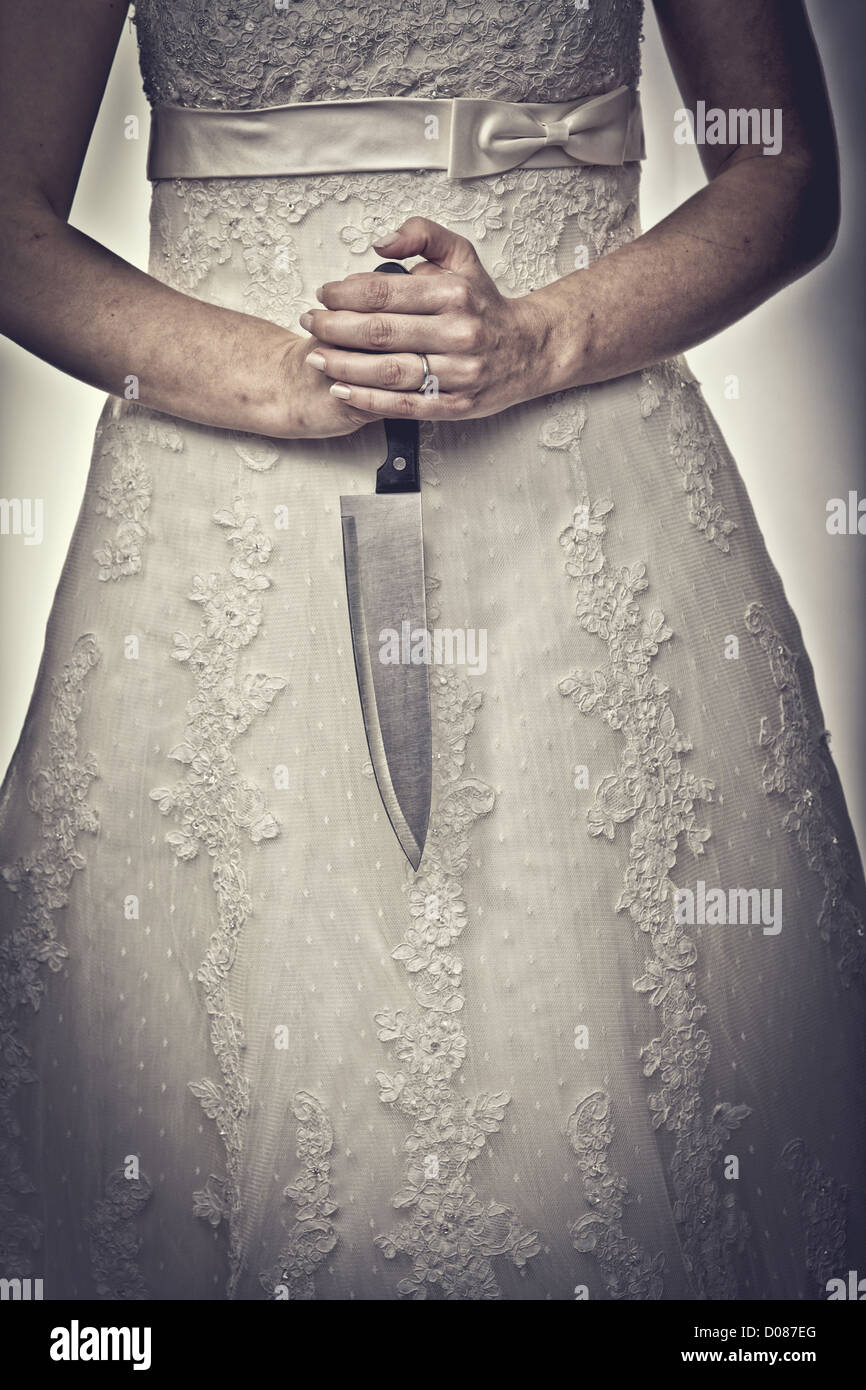 detail of bride holding sharp knife Stock Photo - Alamy