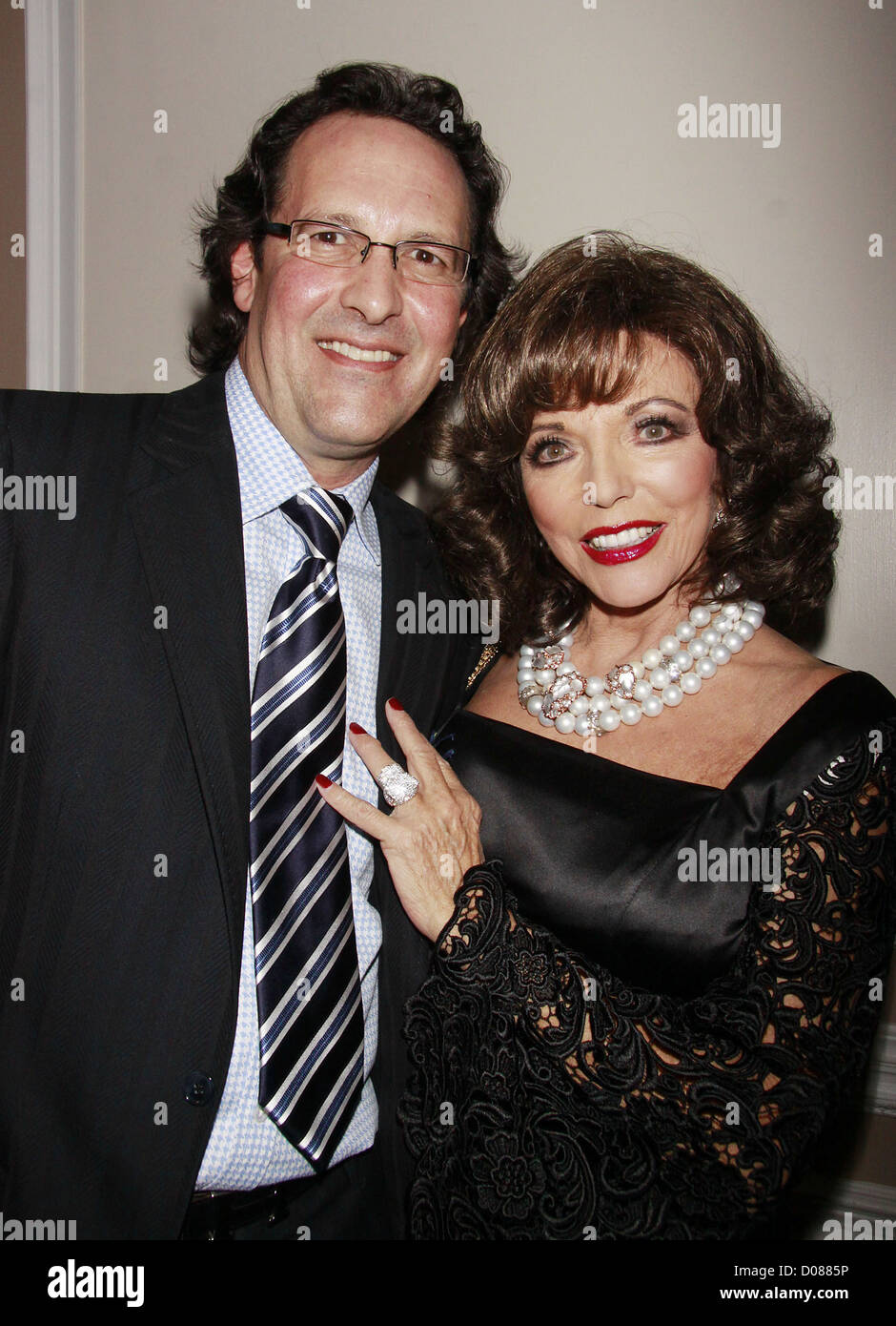 Joan Collins and her husband Percy Gibson attending the reception ...