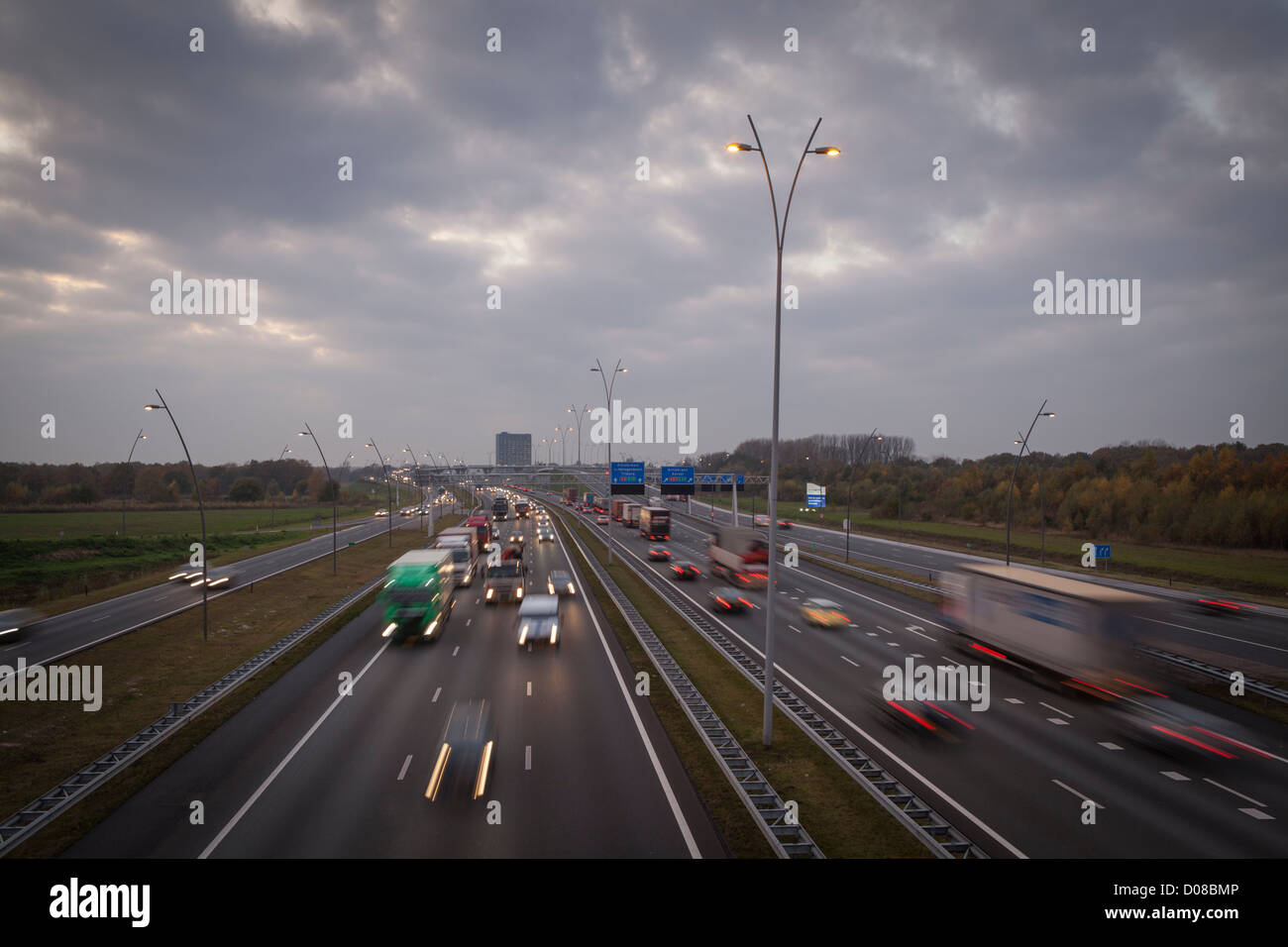 Dutch Highway A67 with trucks and traffic at Eindhoven in the ...