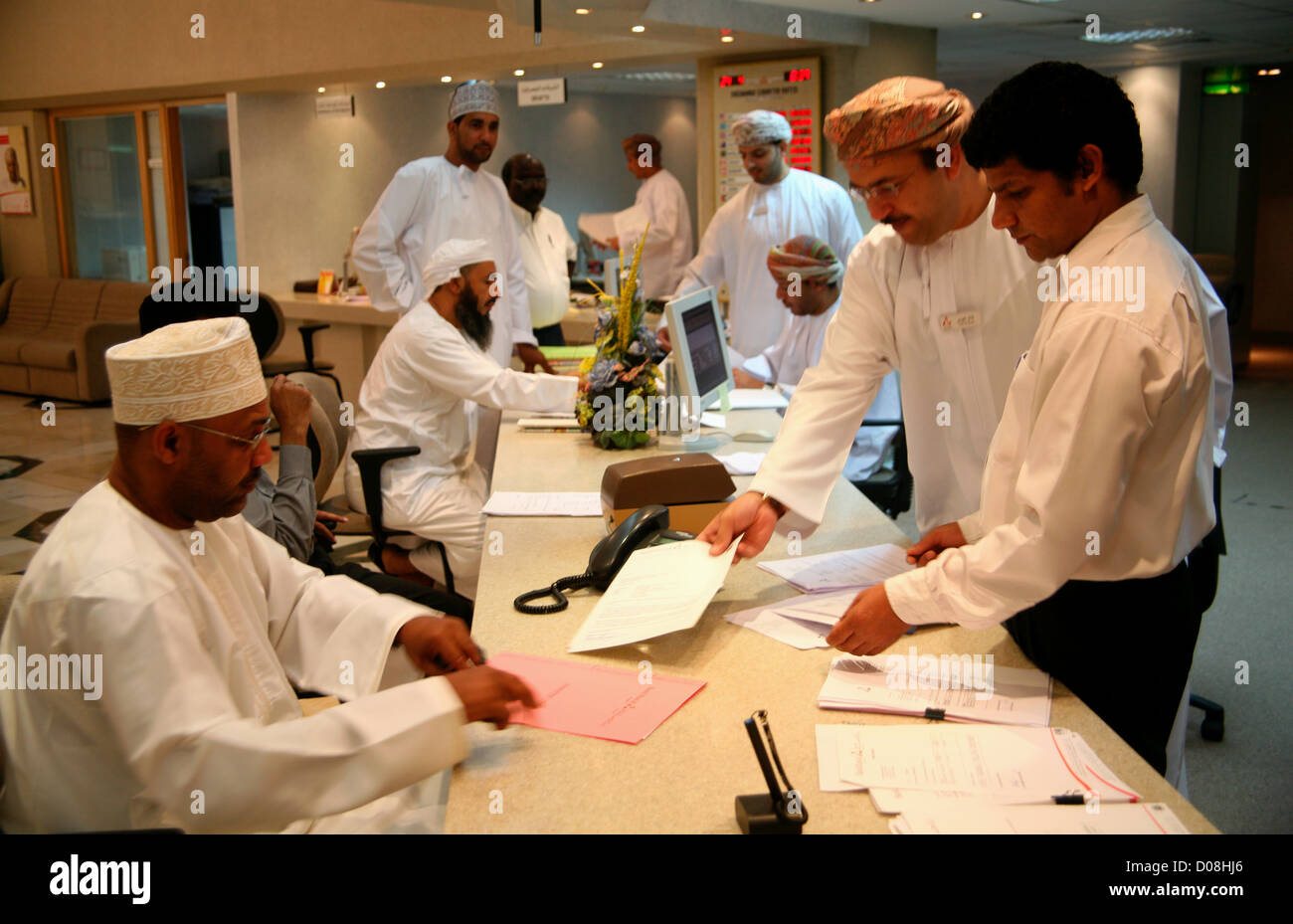 Corporate customers in the Bank Muscat, Sultanate of Oman Stock Photo ...