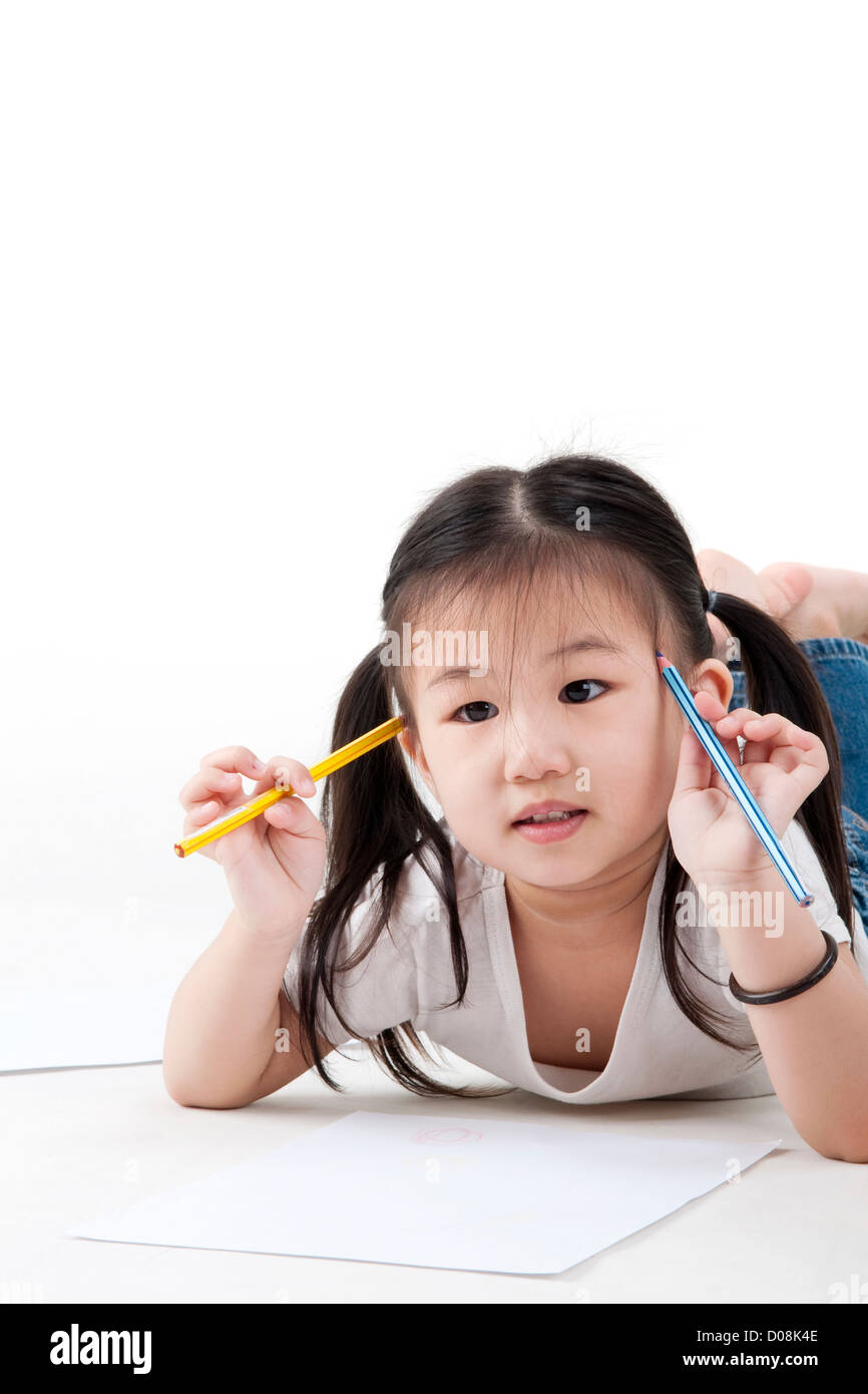 Little girl looking for a drawing concept Stock Photo - Alamy