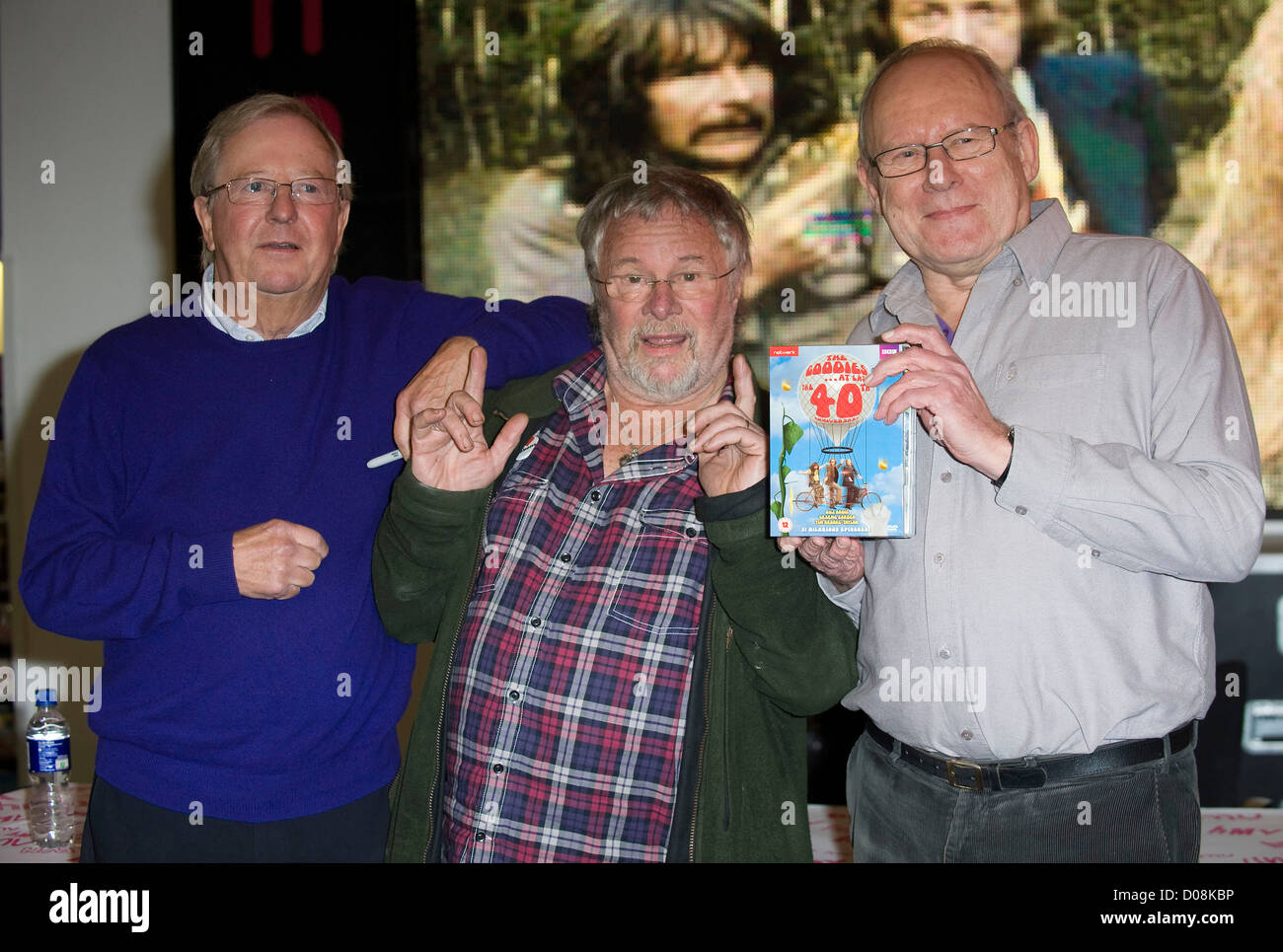 The Goodies (L-R) Tim Brooke-Taylor, Bill Oddie and Graeme Garden sign ...