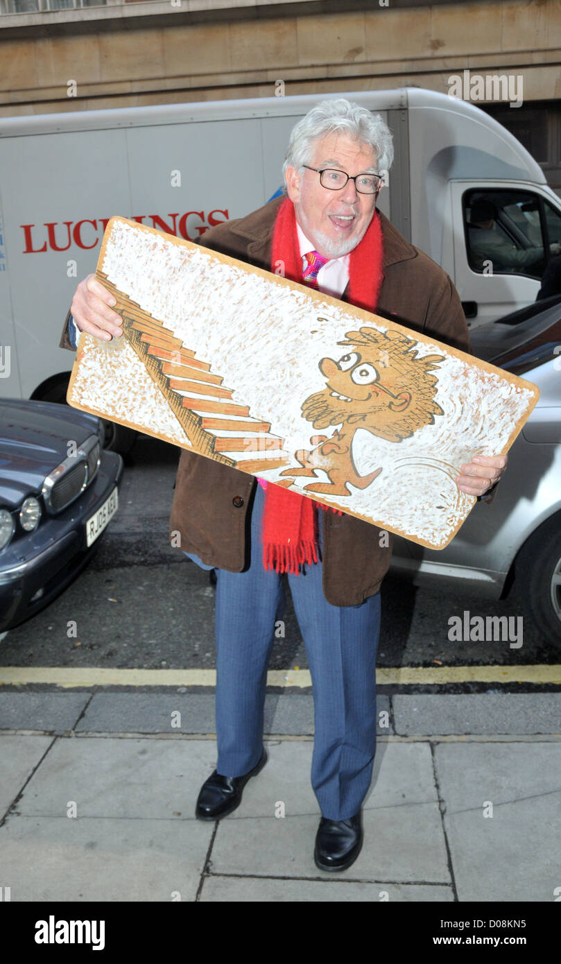 Rolf Harris with his musical instruments Celebrities outside the BBC ...