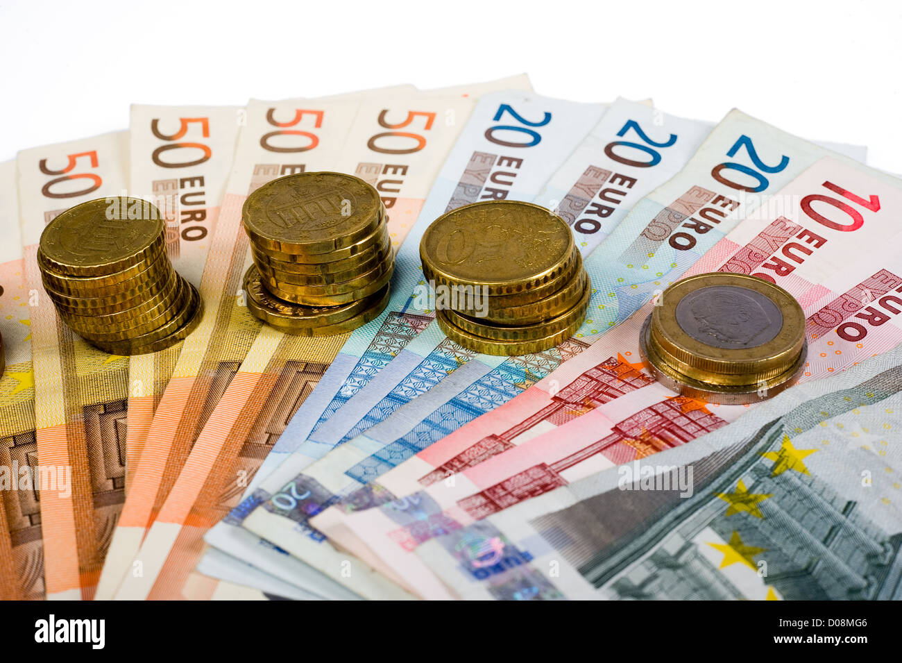 Different currency of paper euro money and coins Stock Photo - Alamy
