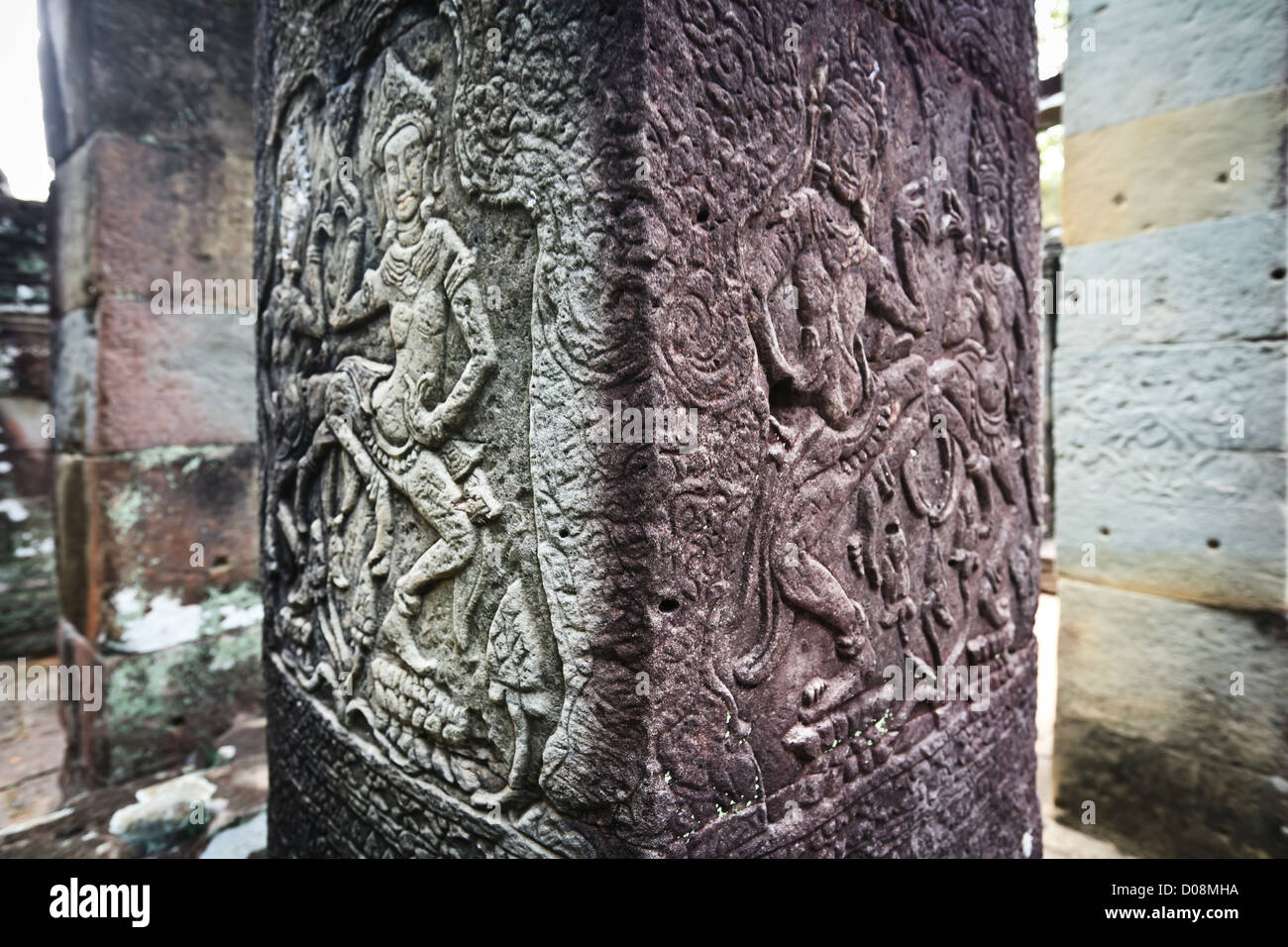 Ancient carvings of apsara dancing woman take on different colors as ...