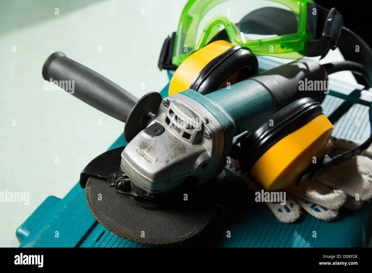 Grinding machine with gloves Stock Photo - Alamy