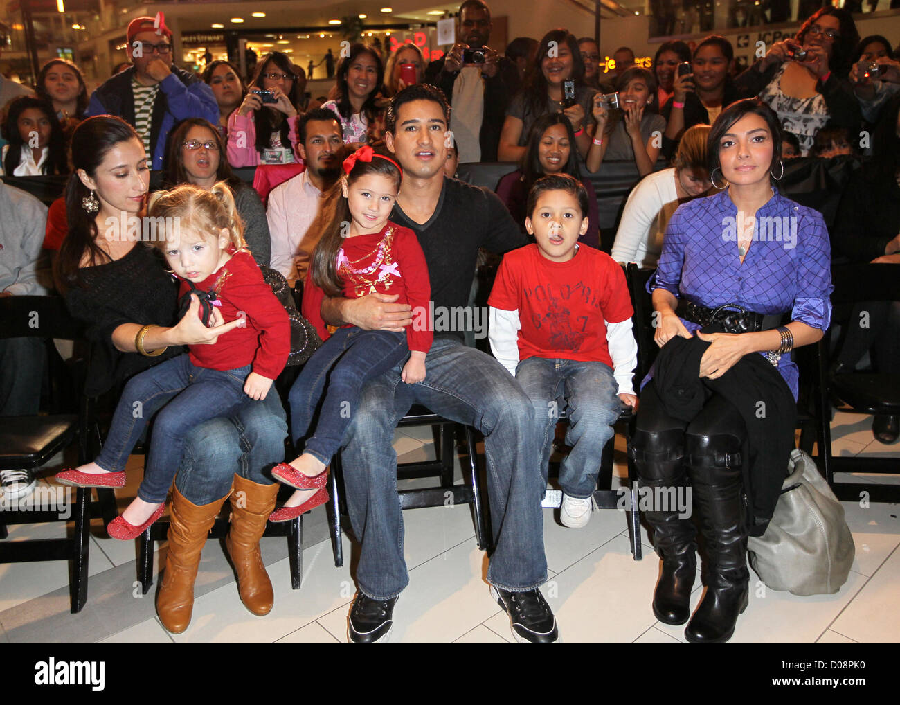 Mario Lopez, girlfriend Courtney Mazza and his family watch members of ...