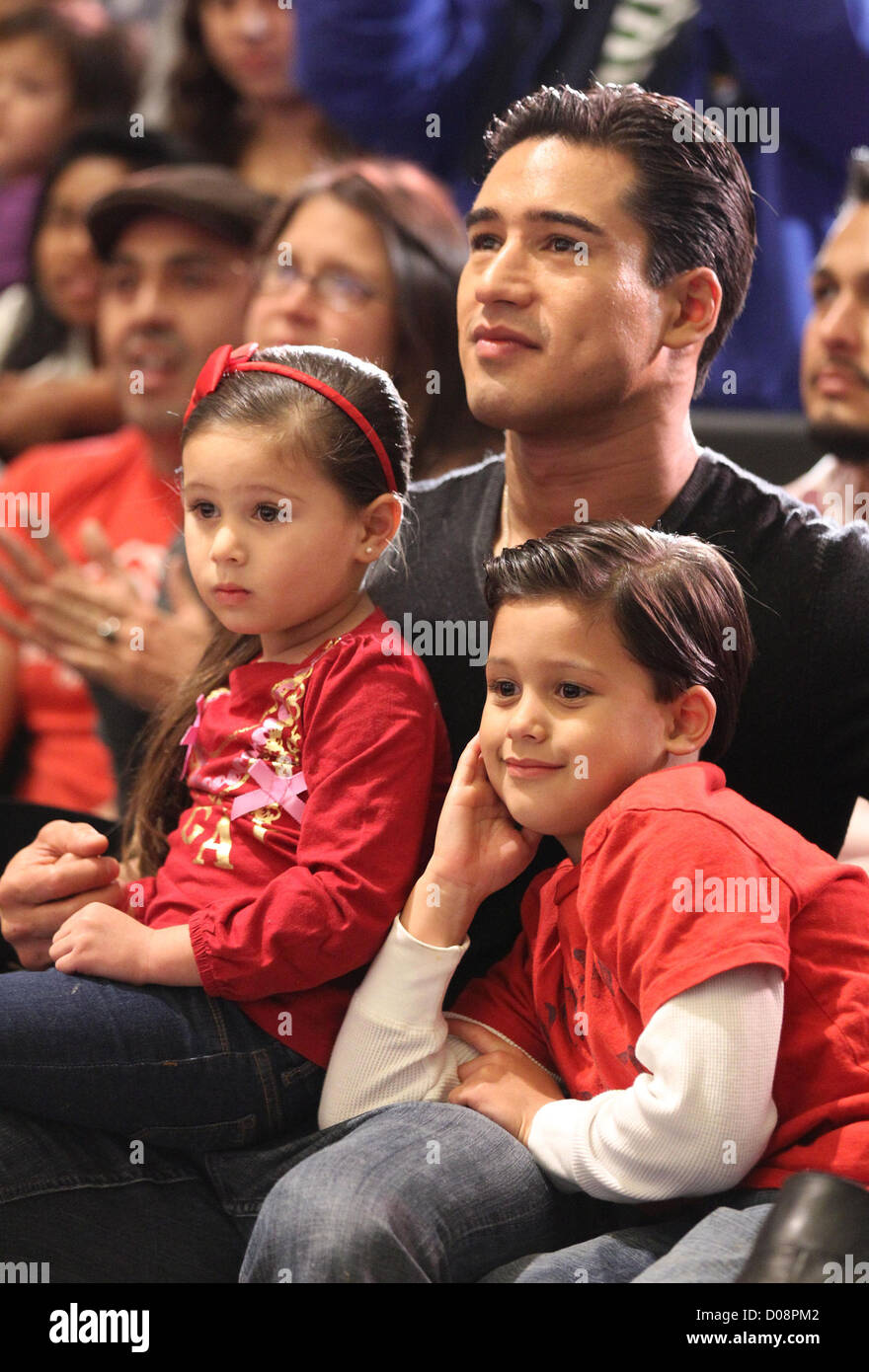 Mario Lopez and his family watch members of BGCV perform a pantomime on ...