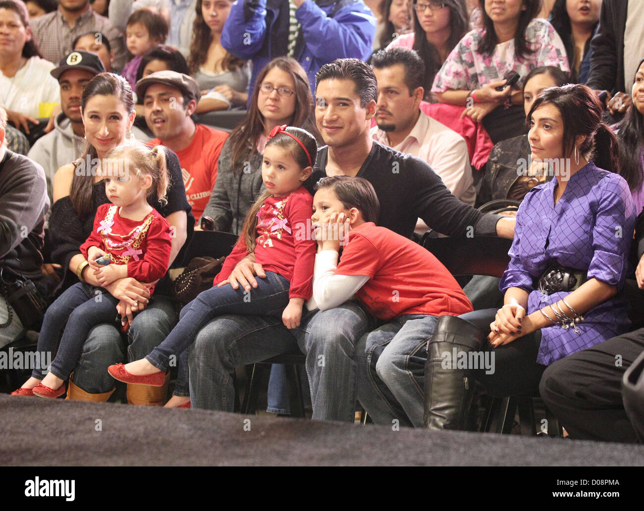 Mario Lopez, girlfriend Courtney Mazza and his family watch members of ...