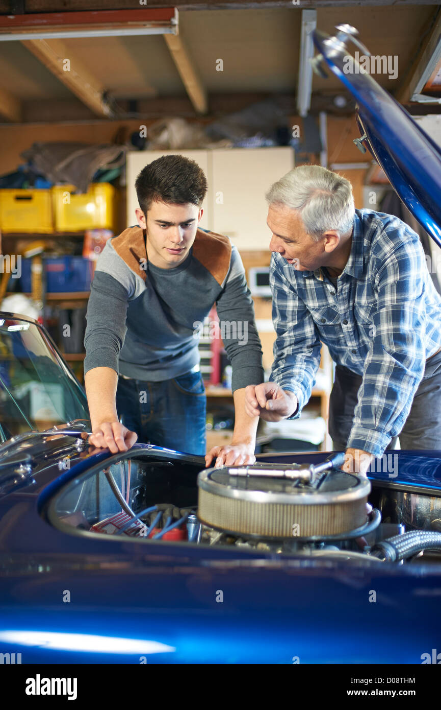 Father son working on car hi-res stock photography and images - Alamy