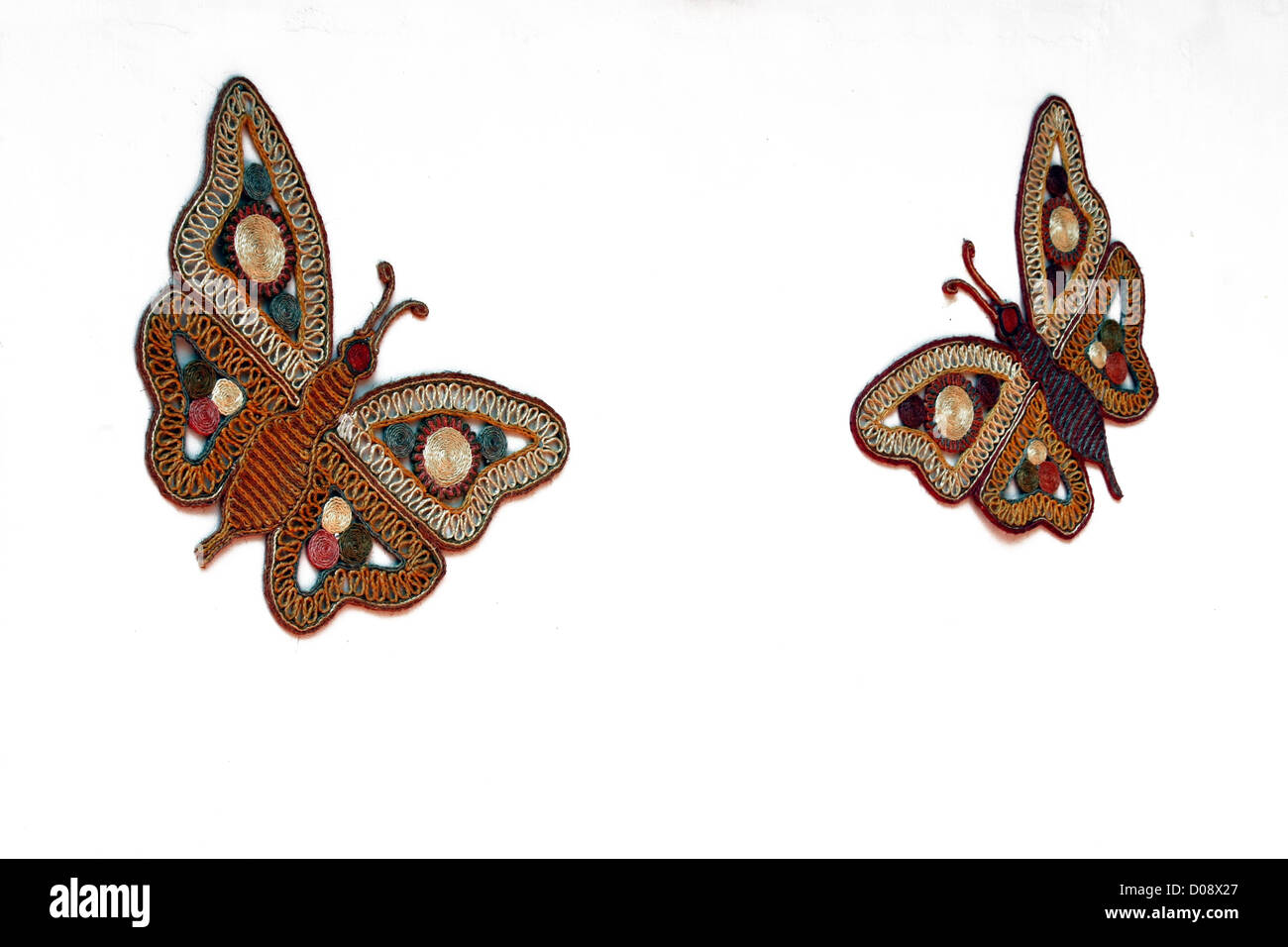 A Butterfly pattern design handicraft on wall Stock Photo - Alamy