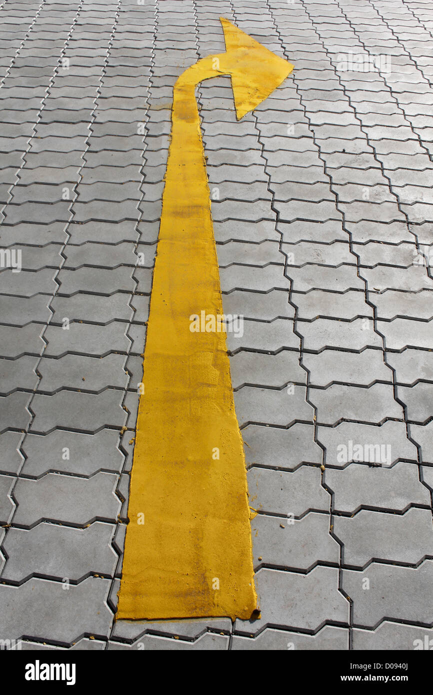 Arrows indicate the direction to be followed by vehicles Stock Photo ...