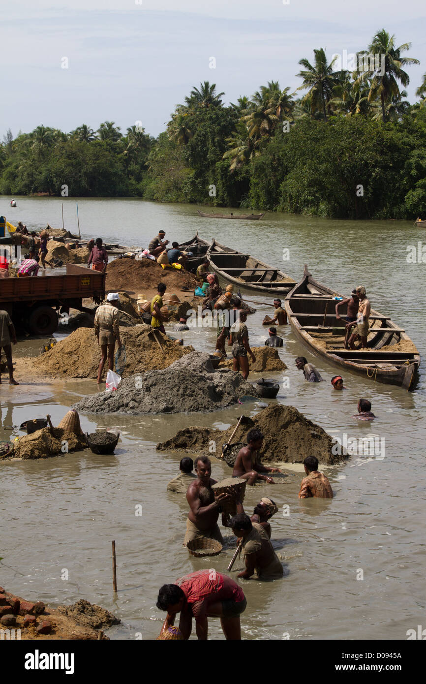 SAND MINERS IN BACKWATERS ZONE WHERE SAND IS EXTRACTED FOR USE AS ...