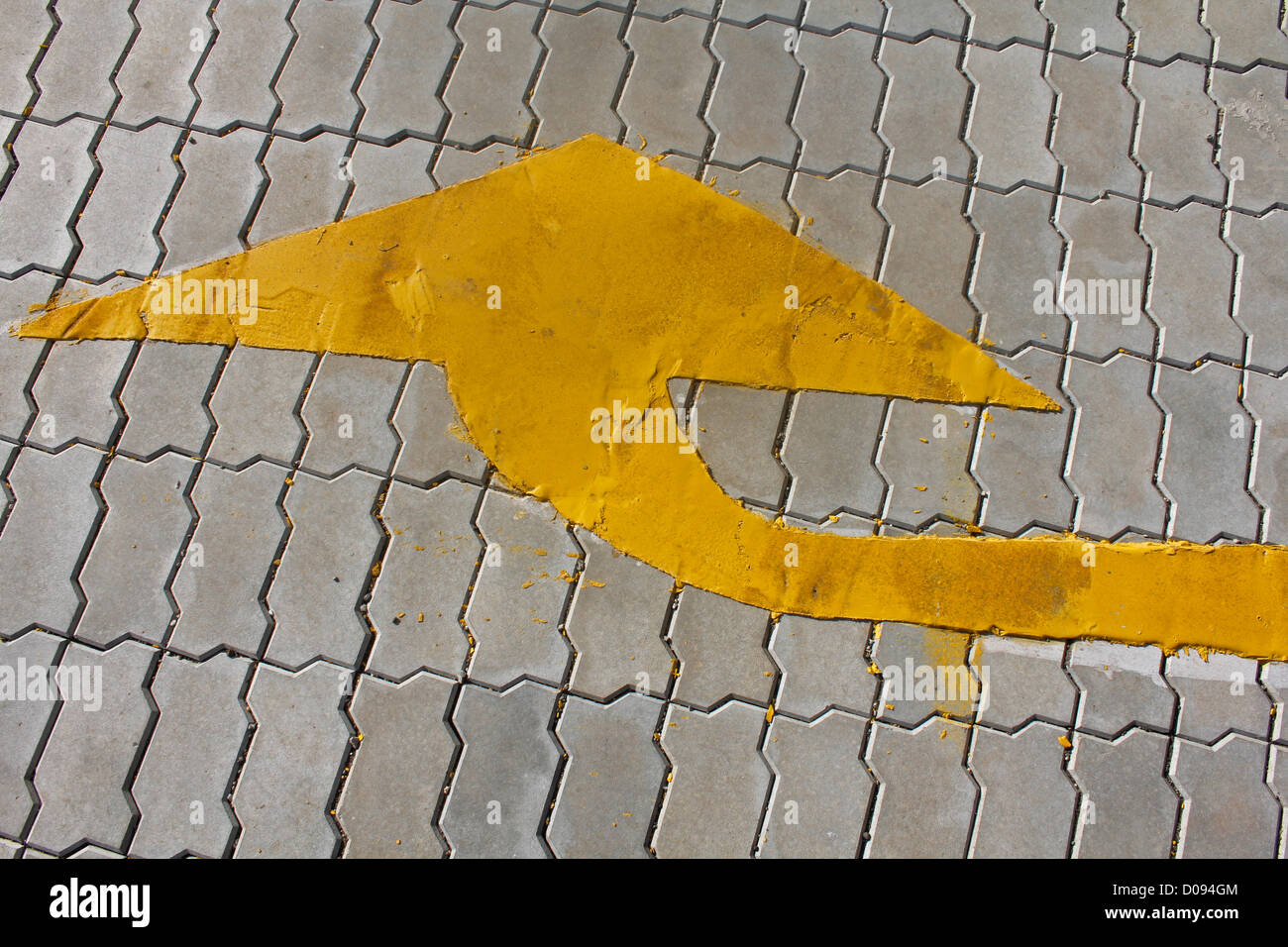 Arrows indicate the direction to be followed by vehicles Stock Photo ...