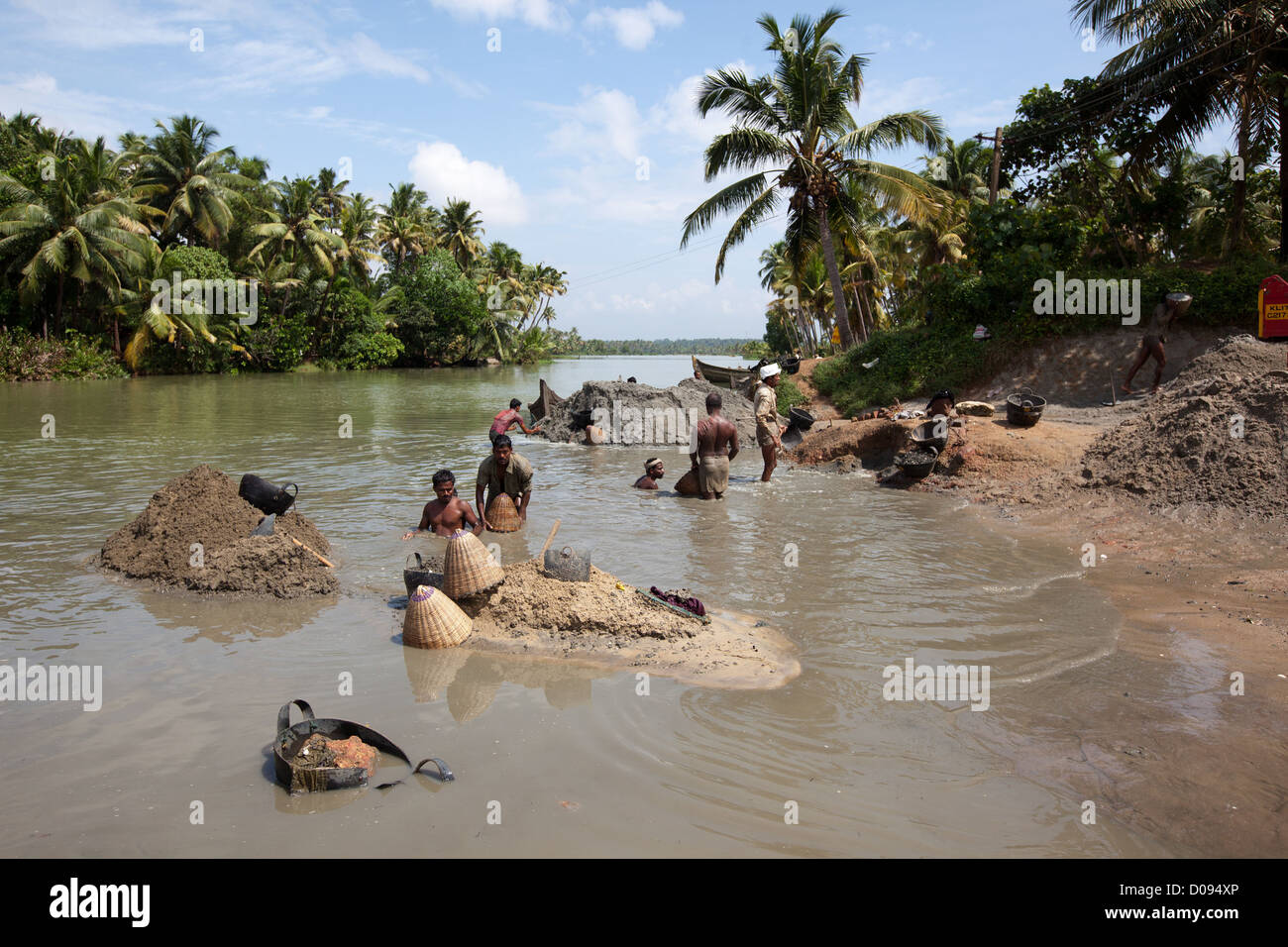 SAND MINERS IN BACKWATERS ZONE WHERE SAND IS EXTRACTED FOR USE AS ...