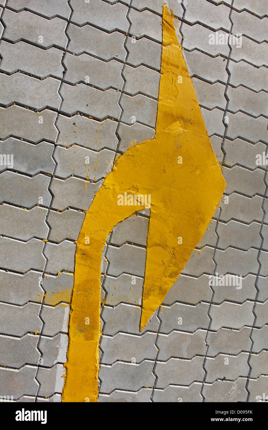 Arrows indicate the direction to be followed by vehicles Stock Photo ...