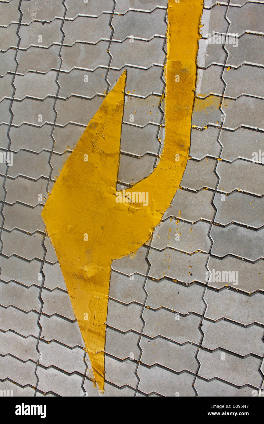 Arrows indicate the direction to be followed by vehicles Stock Photo ...