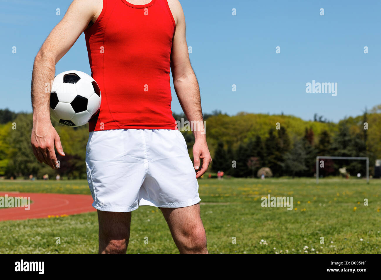 man with a ball in park in summer Stock Photo - Alamy