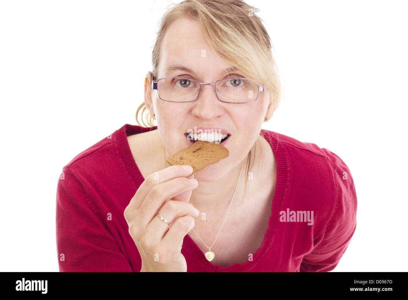 Person eating delicate speculoos Stock Photo - Alamy