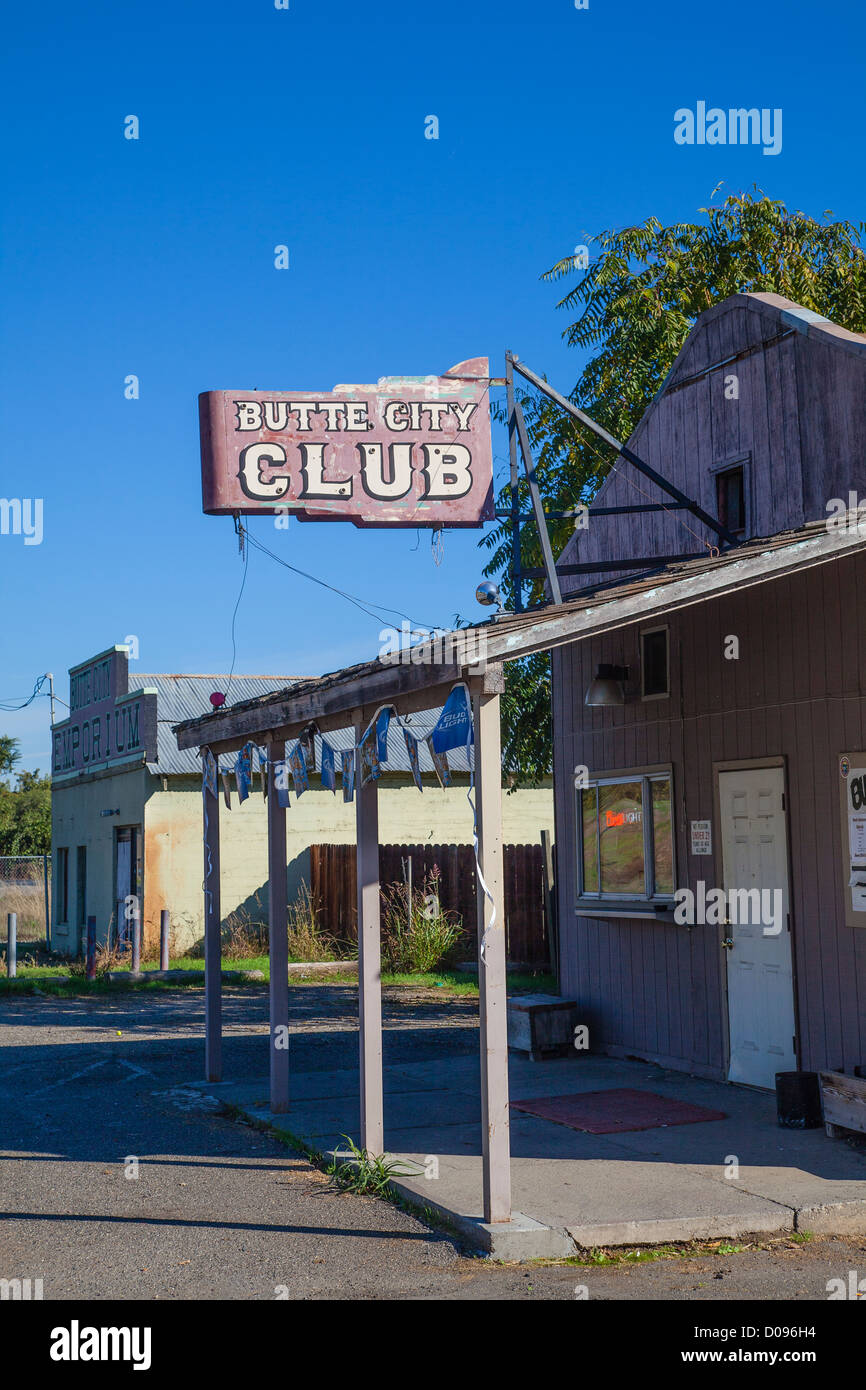 Well weathered old non-working neon sign for Butte City Club hanging ...