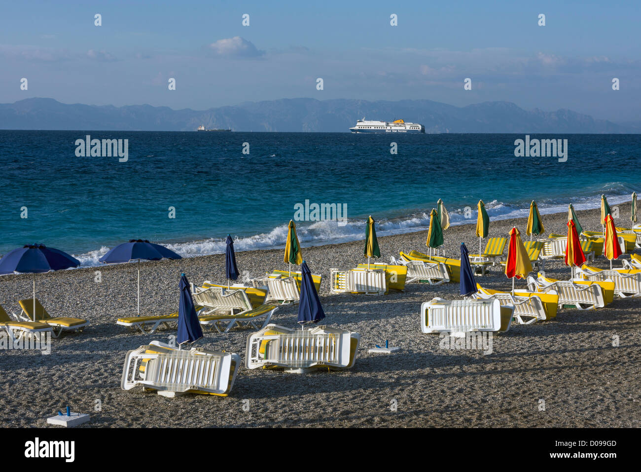 Beach and blue sea Blue Star ferry Rhodes, Rhodos, Greece Stock Photo ...
