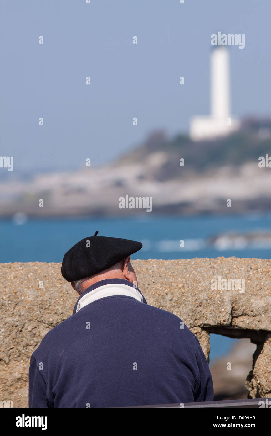 OLD MAN HIS BASQUE BERET CONTEMPLATING ATLANTIC OCEAN LIGHTHOUSE ...