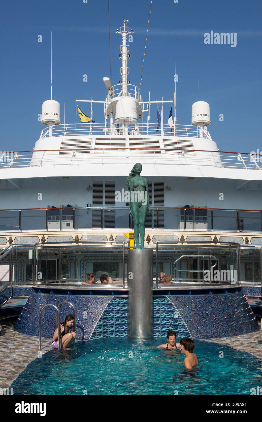 PASSENGERS SWIMMING IN THE POOL OF A BOAT FROM TE COSTA CRUISE LINES ...