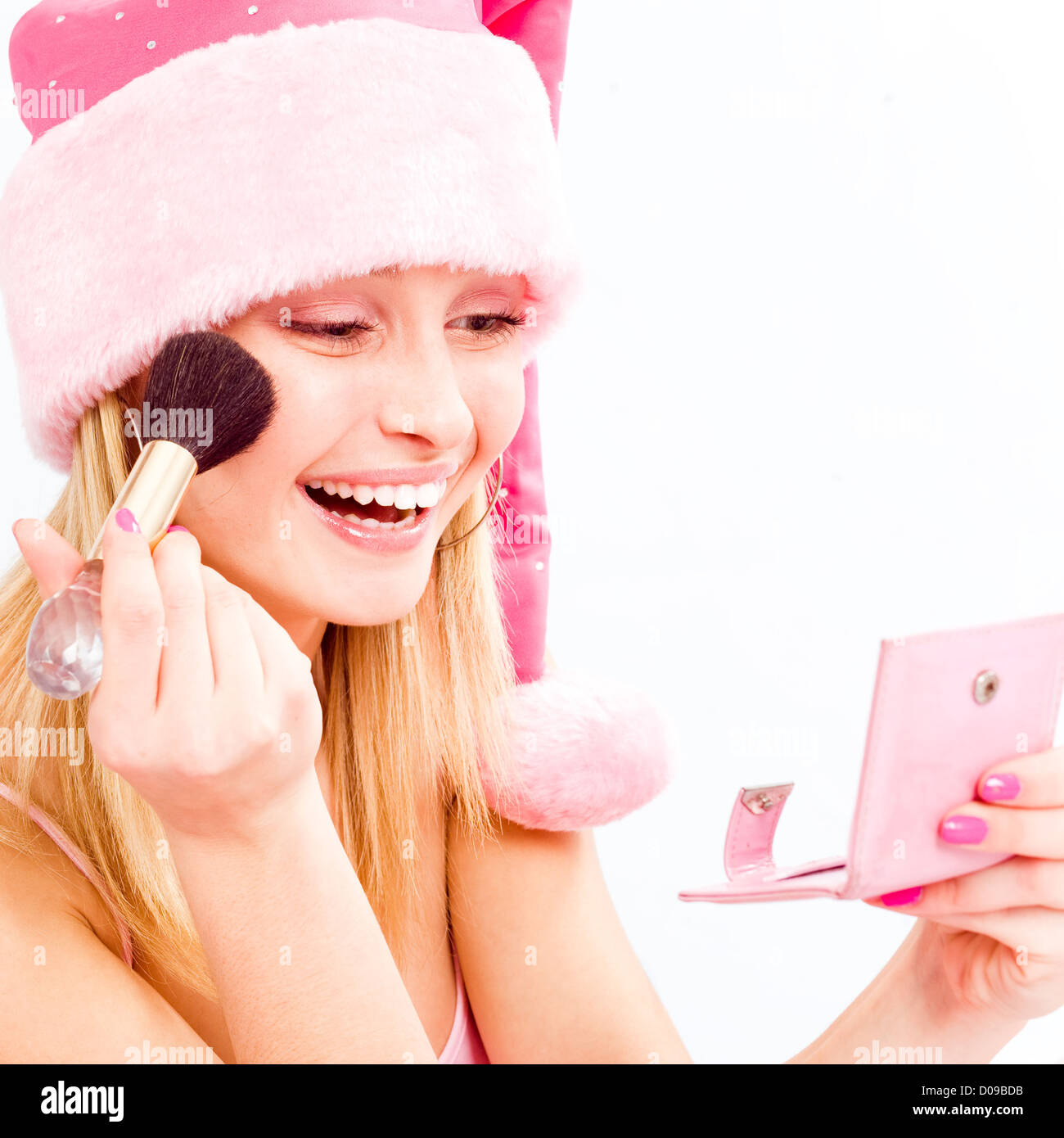 Woman putting santa claus hi-res stock photography and images - Alamy