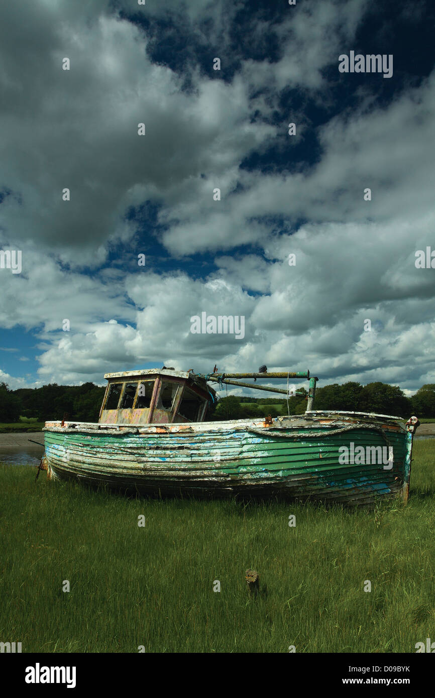 An old fishing boat beside the River Dee, Kirkcudbright, Dumfries and ...