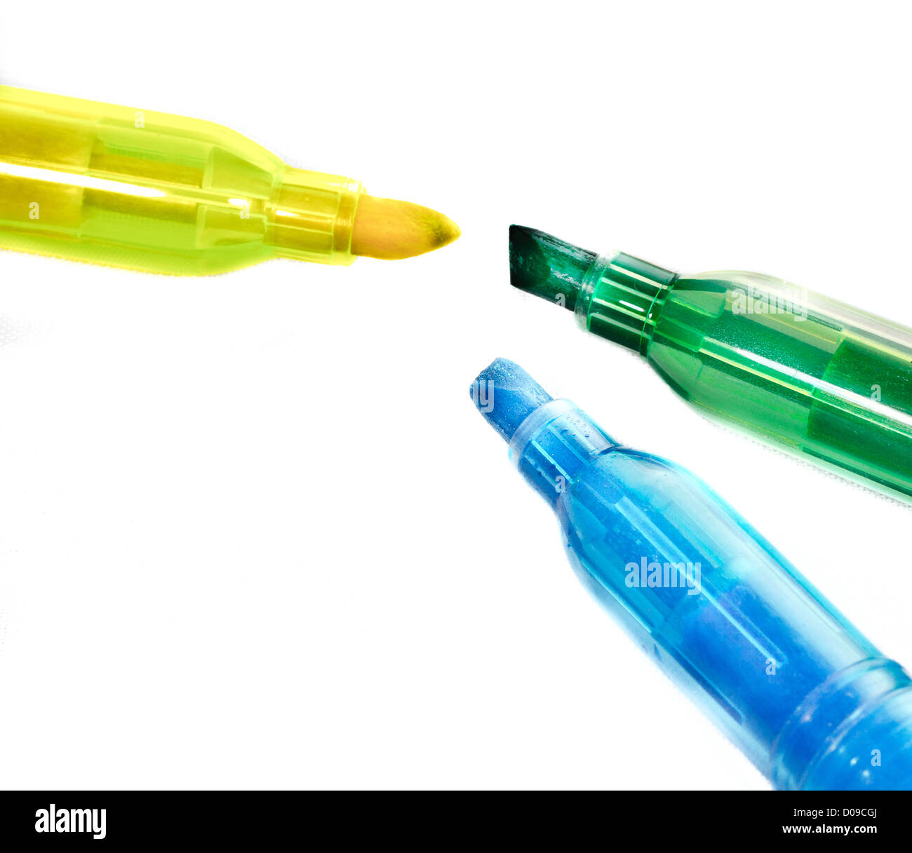 Three coloured pens on white background Stock Photo - Alamy