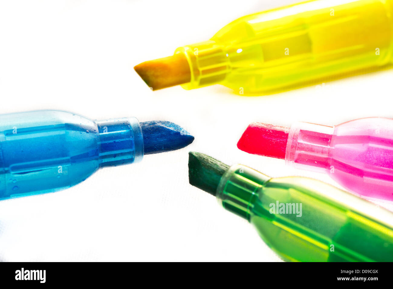 Four colours on white background Stock Photo - Alamy