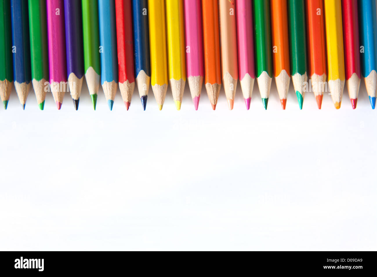 Colorful pencils on white background Stock Photo - Alamy