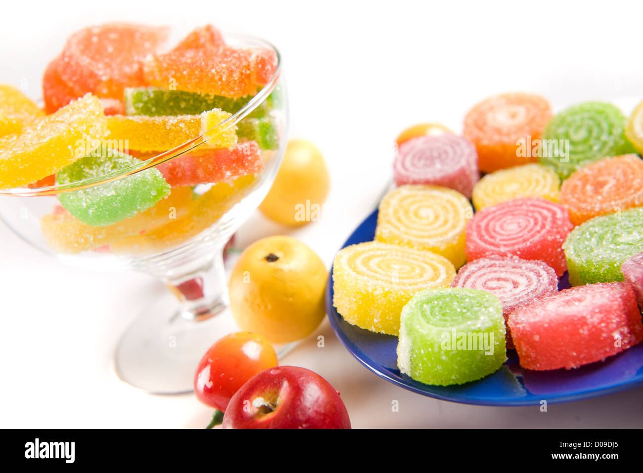 Colorful sweets and fruits on table Stock Photo - Alamy