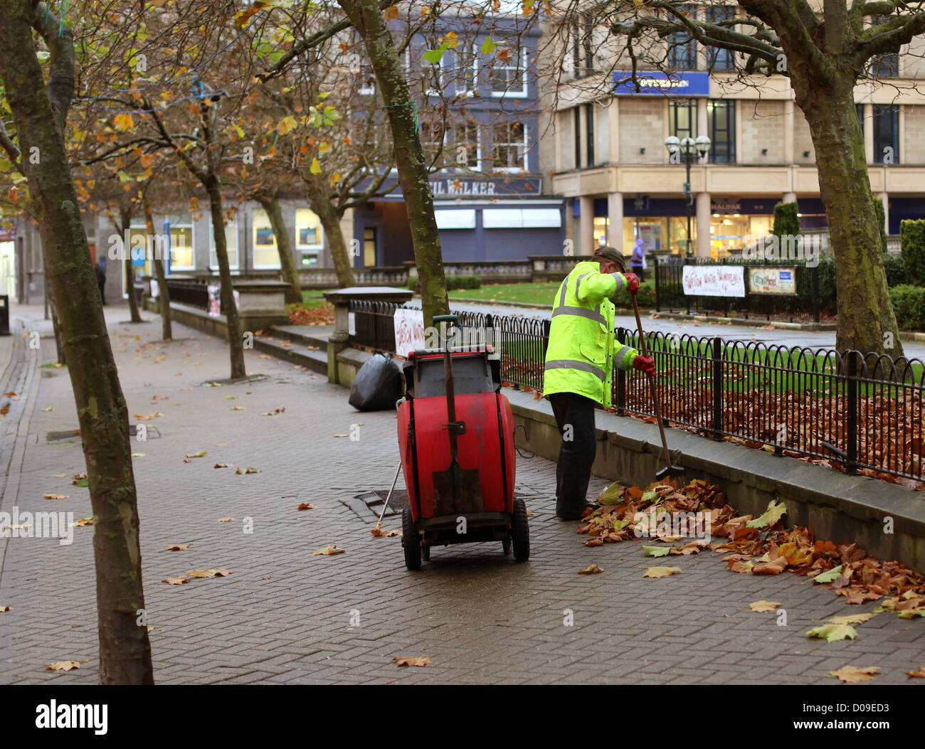Early morning street sweeper cleaning up the leaves of Autumn, Weston ...